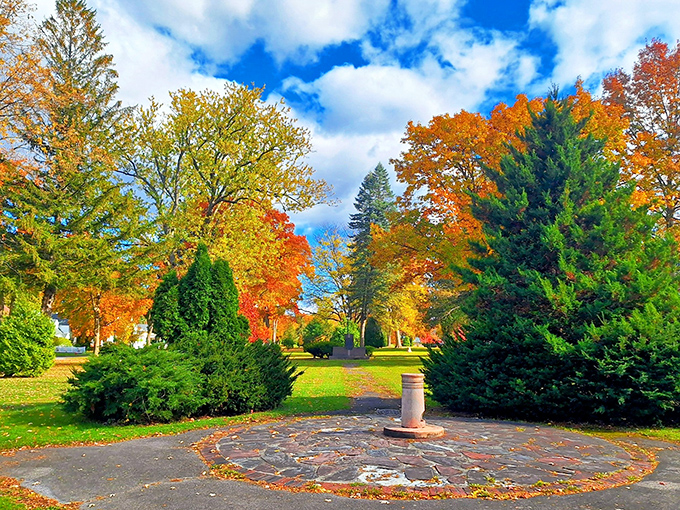 Melchoir Park's stone pathway and vibrant foliage create a pocket of serenity that feels miles away from everyday concerns.