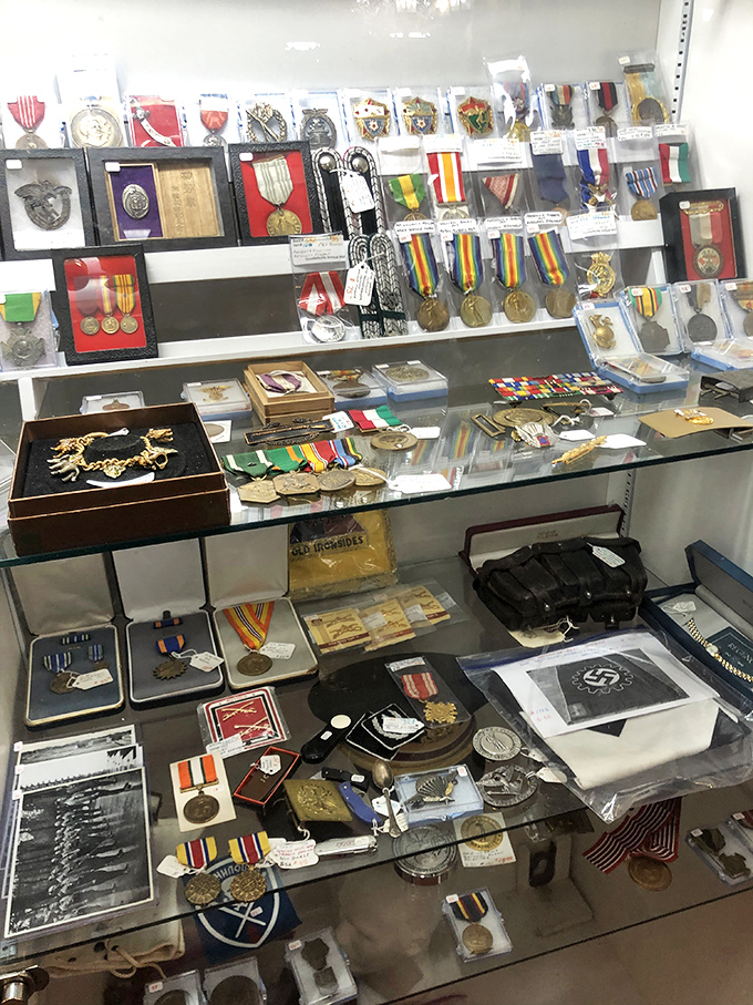 A sobering collection of military history &ndash; medals and insignia that once adorned brave chests now preserved behind glass, each with a story to tell.