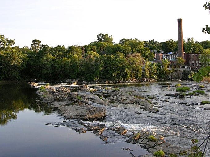 The old mill chimney stands sentinel over the falls, a industrial monument to Winooski's hardworking past and present. 