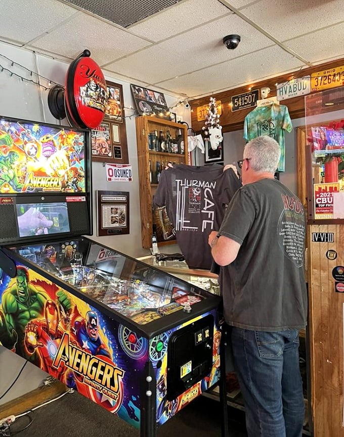 The pinball machine isn't just entertainment&mdash;it's therapy for those waiting for their burger challenge. Work up an appetite with the Avengers.