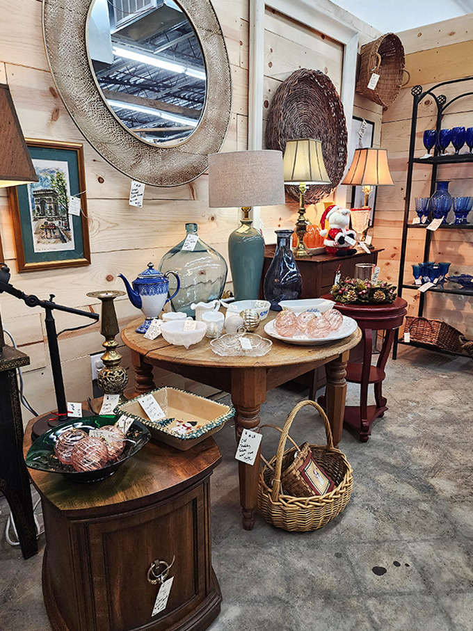 Round tables stacked with glassware, lamps, and baskets create organized chaos that somehow makes perfect decorating sense together.