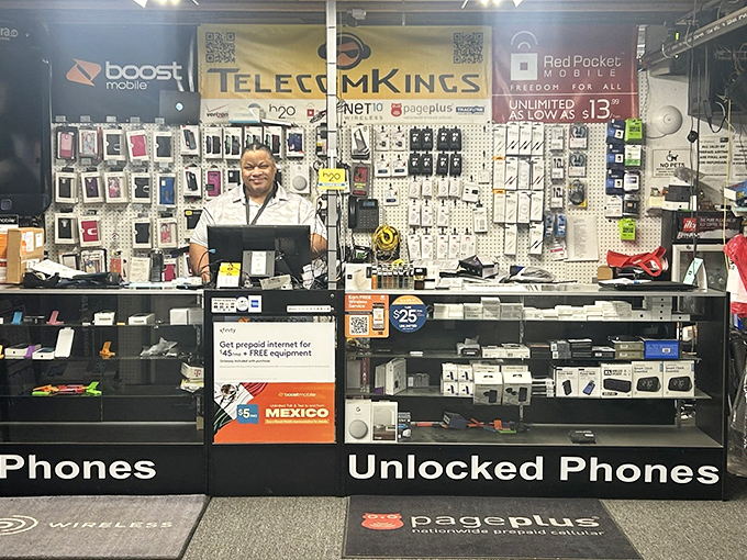Mobile phone services tucked inside a flea market &ndash; because even bargain hunters need to stay connected to the modern world.