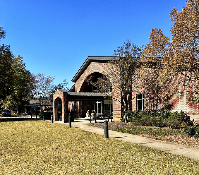The Morgan County Library proves that even in the digital age, the best adventures still begin between covers in buildings made of brick and promise.