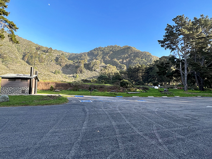 The humble parking area that doesn't hint at the natural splendor waiting just beyond. The best adventures often start unassumingly.