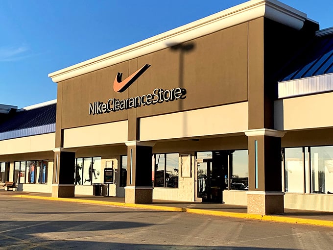 The Nike swoosh beckons like a retail North Star. Athletic aspirations and weekend warrior dreams available at clearance prices.