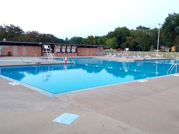 The friendly public swimming pool with the inviting blue-hued water is ready to welcome you for a swim.