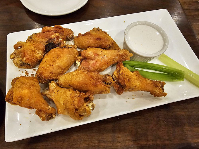 Wings that have been introduced to Old Bay aren't just appetizers; they're a spiritual experience that makes you question why buffalo sauce gets all the glory.