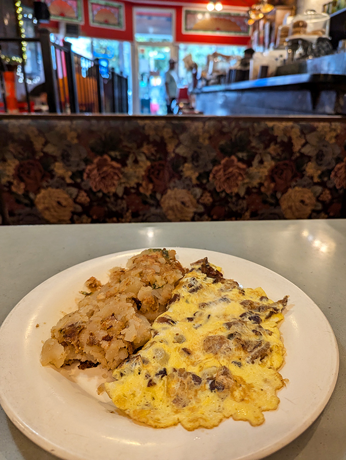 The floral booth upholstery has cradled generations of Brooklyn diners, a soft landing spot for hard conversations and happy celebrations alike.