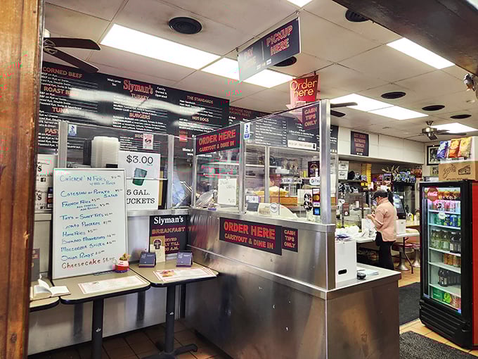 The ordering counter &ndash; where dreams come true and diets go to die, all under the watchful gaze of a menu that promises satisfaction.