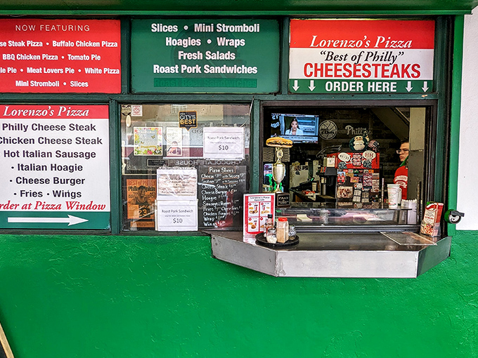 The ordering window at Lorenzo's&mdash;where dreams come true and diet plans go to die, all with a smile and a "whatchu want?"