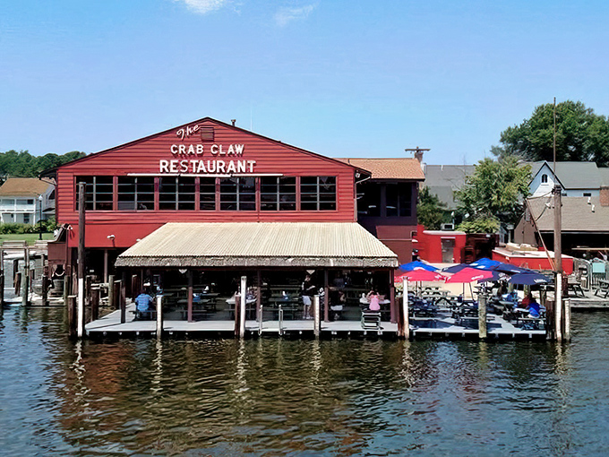 The Crab Claw's waterfront perch isn't just a location&mdash;it's a statement. This red wooden building has witnessed decades of seafood celebrations and maritime memories.