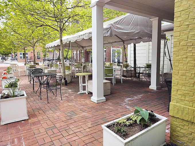 The outdoor patio beckons on sunny days, offering fresh air, flowers, and the perfect backdrop for memorable meals.