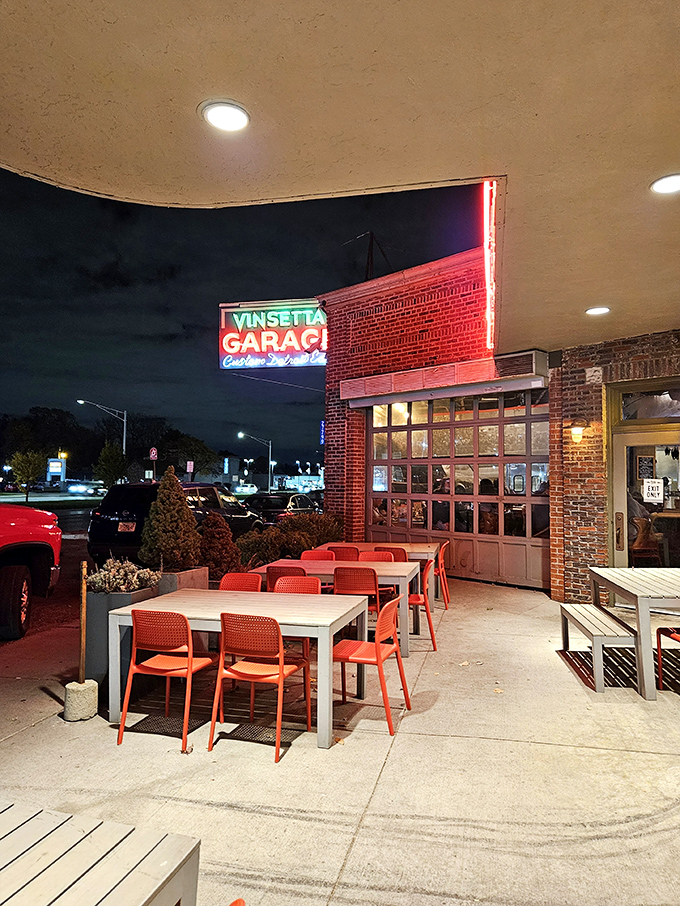 Outdoor seating under the iconic sign where you can dine al fresco while admiring that glorious neon.