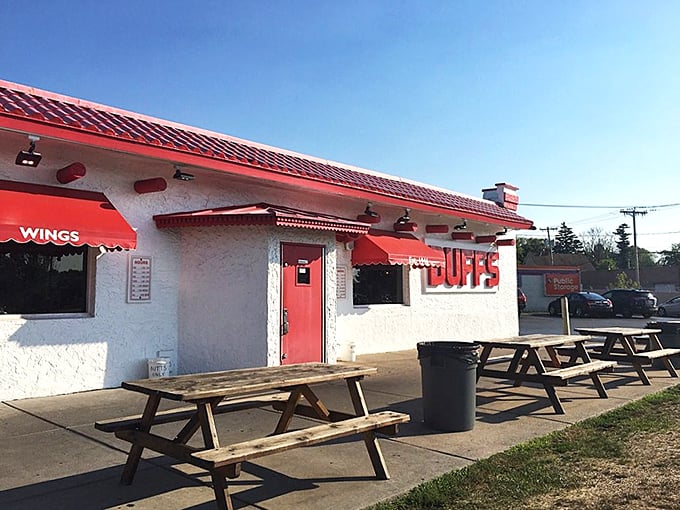 Picnic tables outside for those summer days when sauce on your shirt is a badge of honor, not a laundry emergency.