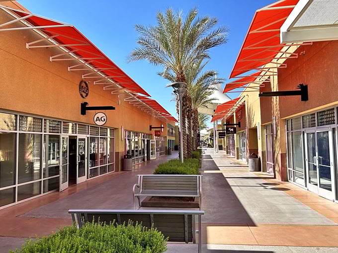 A moment of retail respite between shopping sprints. These shaded benches offer sanctuary when your arms are full but your credit card isn't empty.