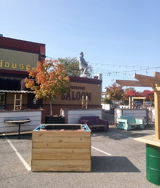 The outdoor patio area with string lights overhead transforms an ordinary parking lot into a gathering space where summer evenings stretch deliciously long.