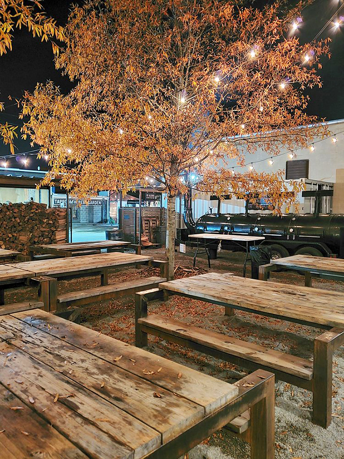 The outdoor beer garden setup lets you enjoy your feast al fresco, where smoke-scented air becomes the world's best appetite enhancer.