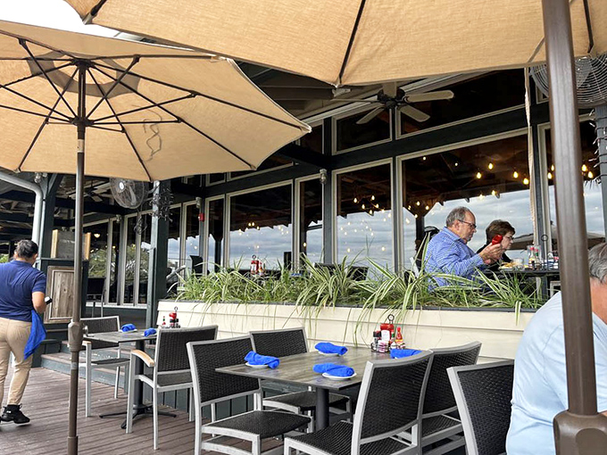 Umbrella-shaded tables offer front-row seats to Lowcountry's greatest show: the ever-changing coastal landscape.