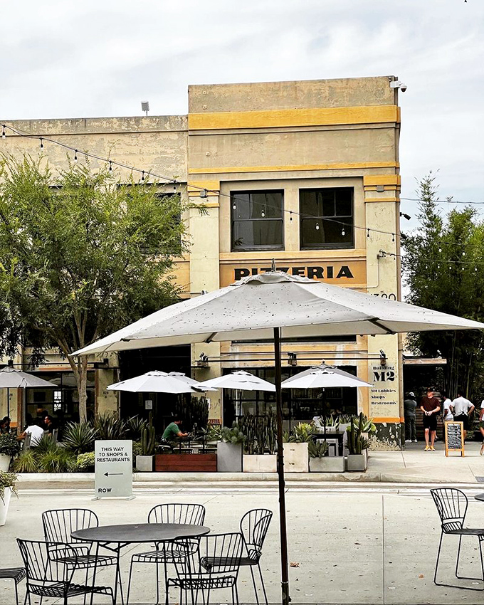 The outdoor seating area beckons like an urban oasis—a front-row seat to DTLA life with the promise of pizza perfection just steps away.