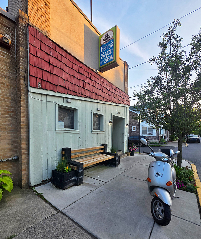 Curbside charm that says "come as you are." That bench isn't just for waiting—it's for savoring the anticipation of what's to come.