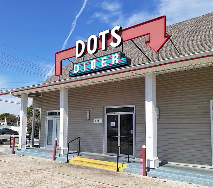 The welcoming entrance to breakfast paradise &ndash; where that red arrow points the way to pancake heaven and morning salvation.