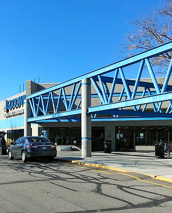 Morning light catches the distinctive blue framework, signaling another day of discovery for Colorado's most resourceful shoppers.