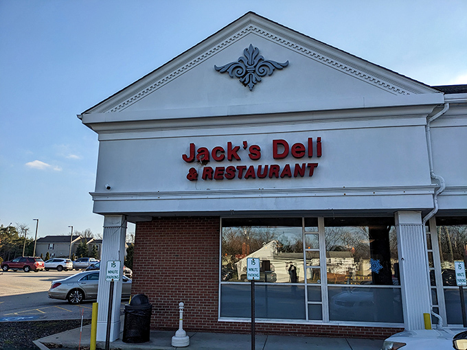 The classical architectural details above the entrance suggest what awaits inside—timeless flavors that never go out of style.