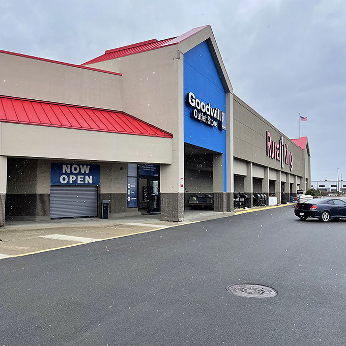 Even on cloudy days, the Goodwill Outlet's distinctive blue entrance promises sunshine for budget-conscious shoppers.