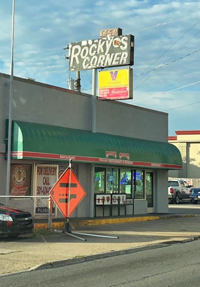 The vintage Rocky's Corner sign announces you've arrived at Hot Springs' little slice of Chicago right here.