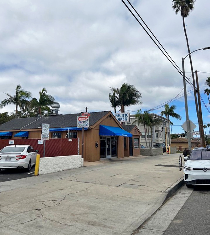 Palm trees frame the humble exterior of Pacific Diner, where California casual meets breakfast perfection under typically gorgeous SoCal skies.
