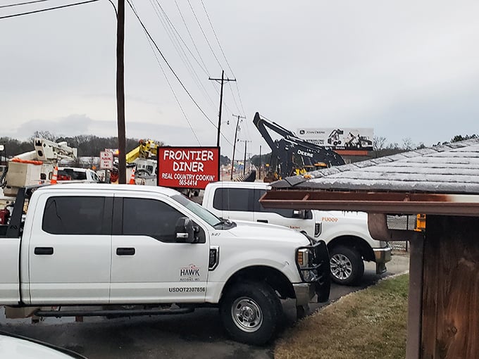The parking lot tells the story&mdash;work trucks lined up outside Frontier Diner, where "Real Country Cooking" isn't just a slogan, it's a promise.