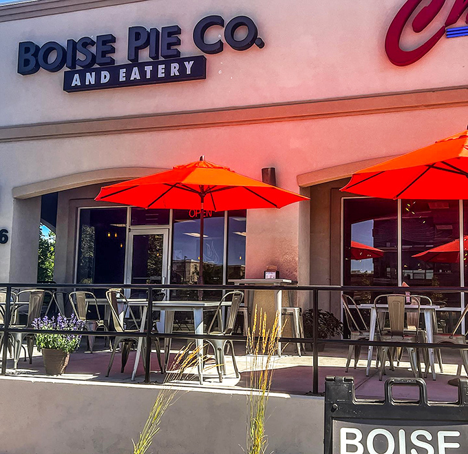 The outdoor seating area with bright orange umbrellas beckons like a cheerful invitation to enjoy pie in the Idaho sunshine.