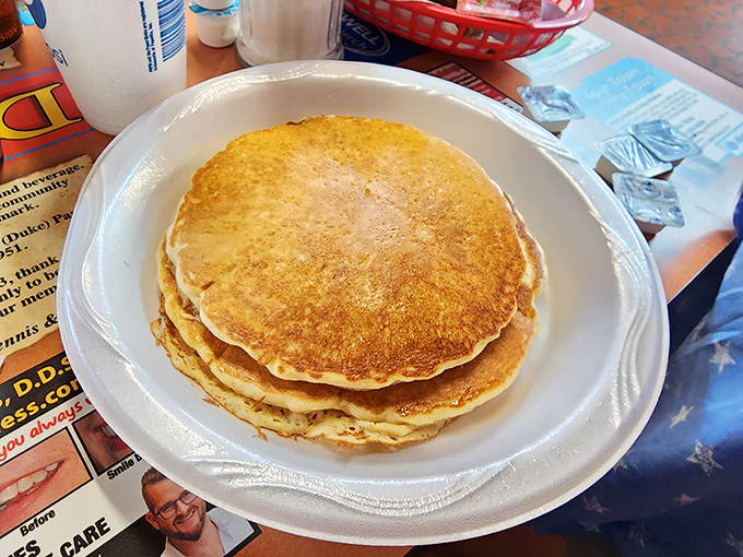 Fluffy pancakes that look like they were poured with love and flipped with decades of practice and morning dedication.