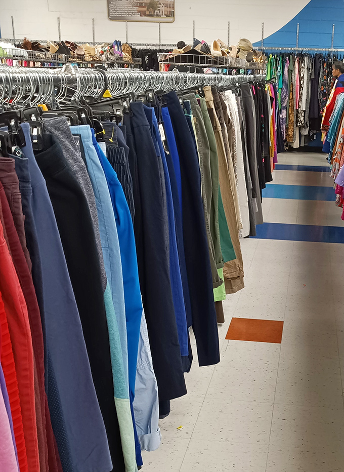 Pants organized by shade create a denim rainbow that stretches toward infinity and beyond your expectations.