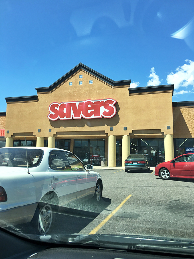 The Savers mothership beckons from its parking lot. That glowing red sign promises adventure for those brave enough to enter its treasure-filled domain.