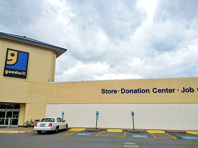 The exterior view reveals the triple mission: Store, Donation Center, and Job Center&mdash;retail therapy that actually helps your community.