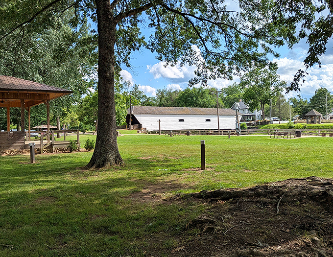 The surrounding park offers shady spots perfect for picnics, with the bridge providing both a conversation piece and protection from sudden summer showers.