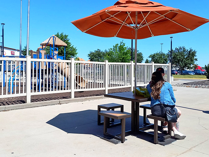 Even outlet malls need playgrounds and picnic areas, because shopping is exhausting work that requires strategic rest periods.