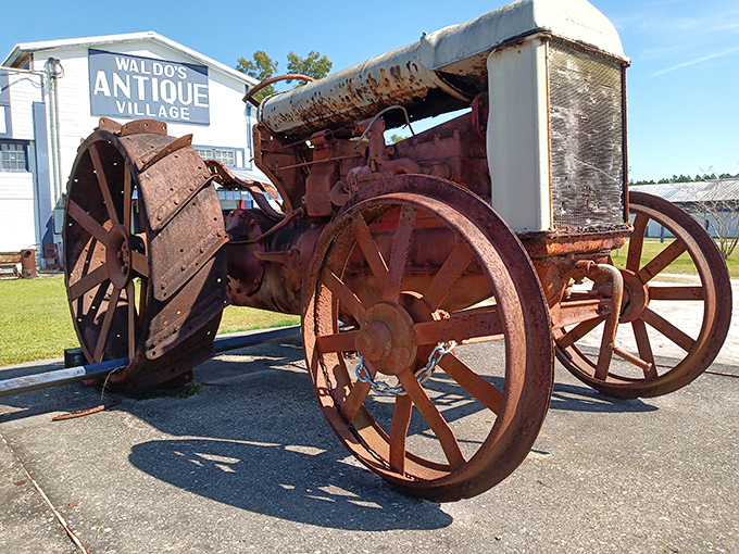 This antique tractor isn't just farm equipment&mdash;it's a rusty reminder of Florida's agricultural heritage, standing guard outside Waldo's Antique Village.