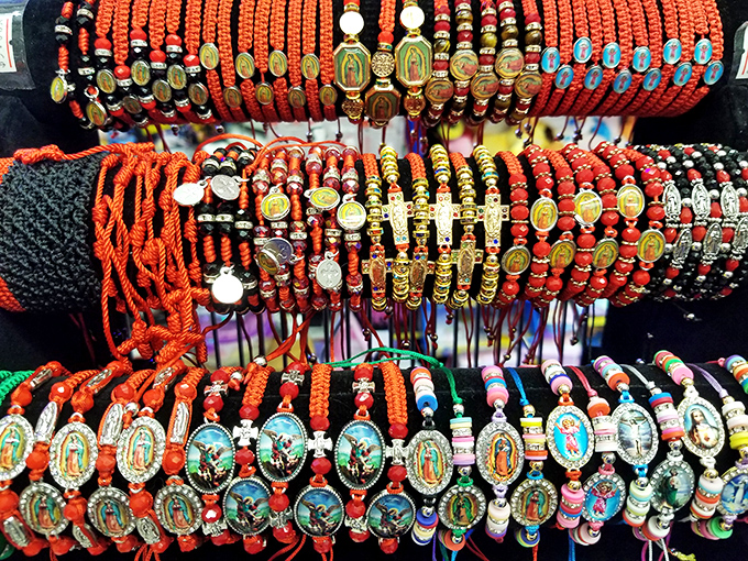 Spiritual style on display! These vibrant religious bracelets blend faith and fashion in a rainbow of devotional accessories.