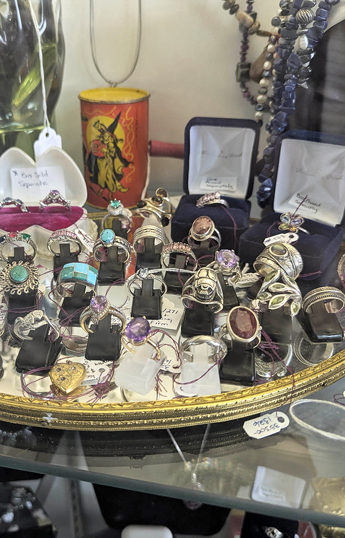 Gemstones and silver settings that have adorned fingers through decades of history, each ring a tiny time capsule.
