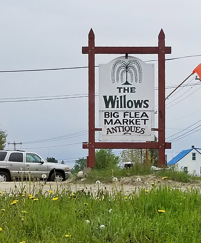 The iconic sign that beckons treasure hunters from miles around, promising adventures in antiquing that can't be found on any map.