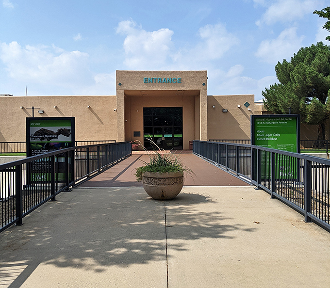 The Roswell Museum Art & Center welcomes visitors across a sun-drenched entrance, offering cultural enrichment that fits comfortably within a $1,200 monthly budget.