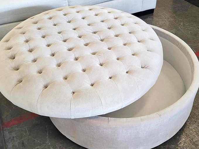 The tufted ottoman that could hide your remote collection or serve as impromptu seating when friends drop by unexpectedly.