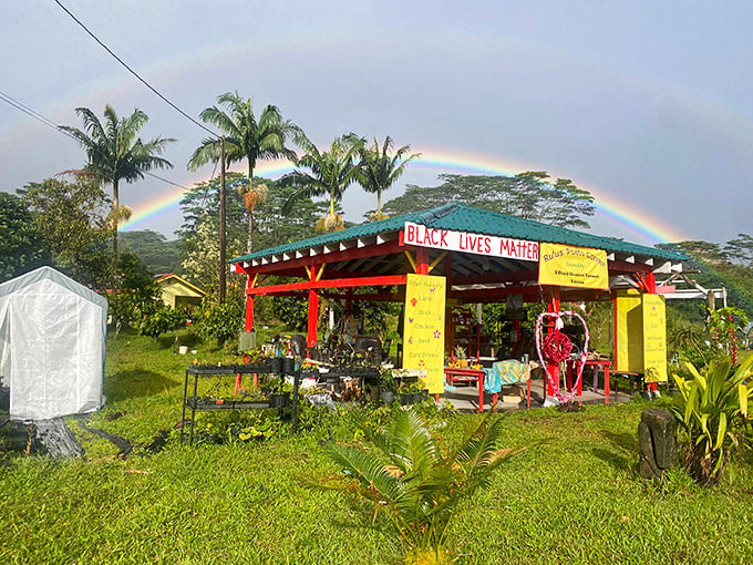 A rainbow blessing this colorful market stand feels almost too on-the-nose. Mother Nature showing off her Hawaiian marketing skills.