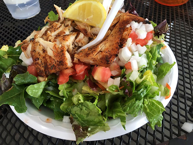 A salad that actually satisfies &ndash; blackened fish atop fresh greens with pico de gallo. Proof that "eating light" doesn't have to mean "still hungry."