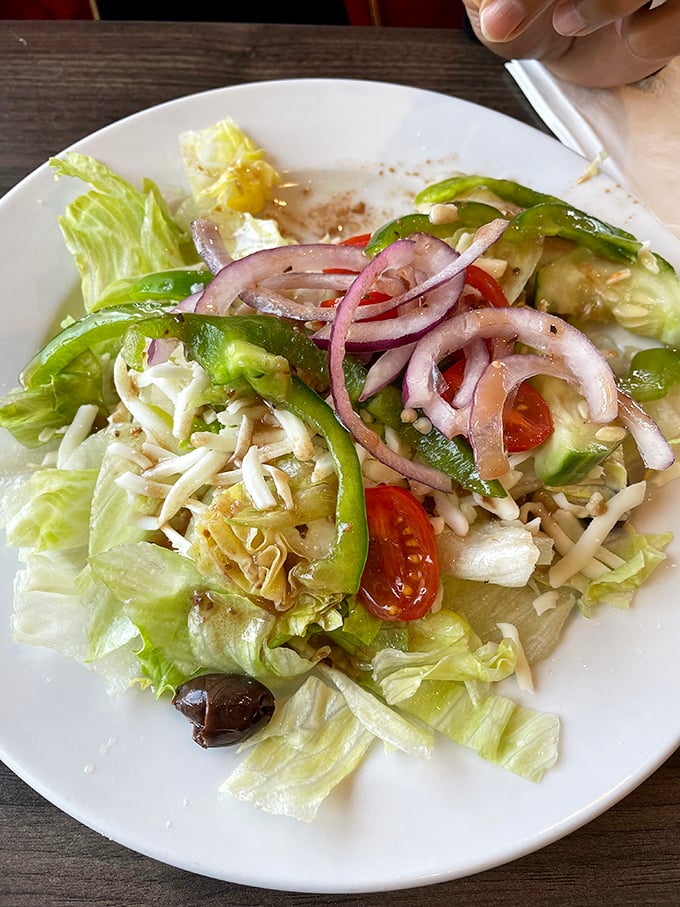 A proper Italian salad doesn't apologize for bold flavors. Those red onions and green peppers aren't hiding&mdash;they're announcing themselves with pride.