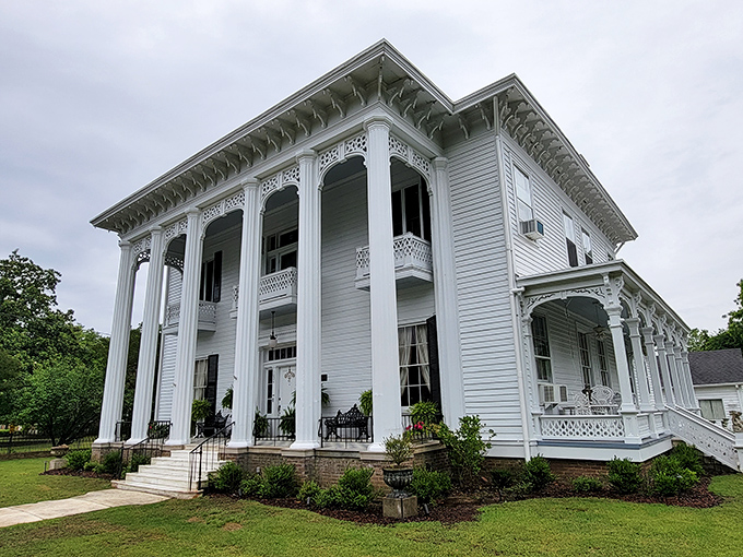 Shadowlawn's pristine white columns and intricate woodwork showcase the architectural grandeur that makes Southern homes both imposing and somehow warmly inviting.