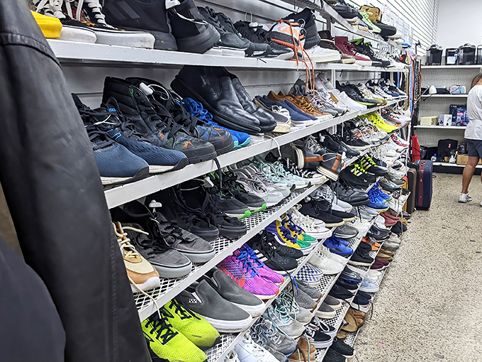 The shoe section&mdash;a footwear library where barely-worn sneakers and dress shoes stand at attention, ready for second chances at fraction-of-retail prices.