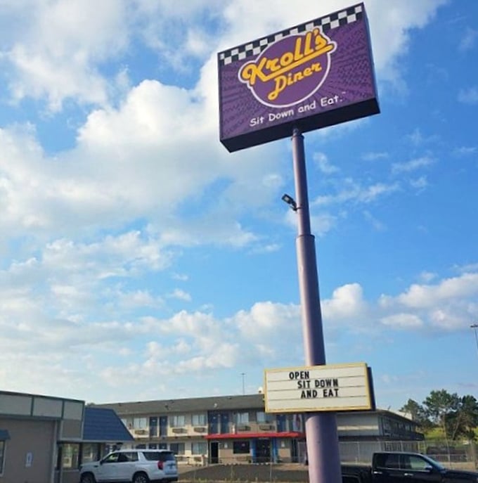 The Kroll's sign stands tall against the North Dakota sky, a purple beacon of hope for the hungry traveler and local alike.